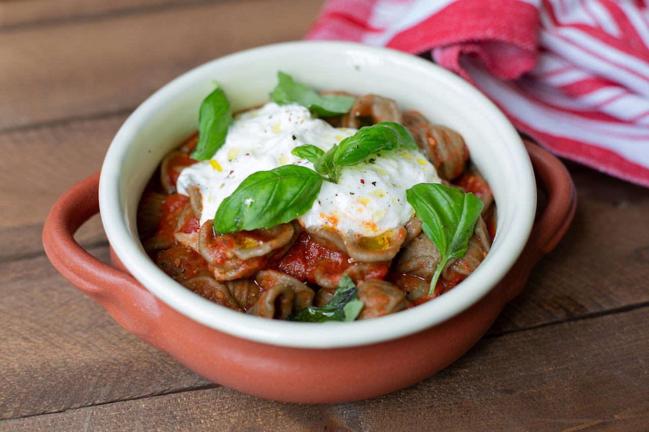 Orecchiette di Grano Arso with cherry tomato sauce, stracciatella and ...